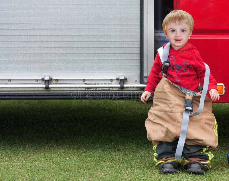 Boy fireman stock image. Image of fire, child, engine - 9698057