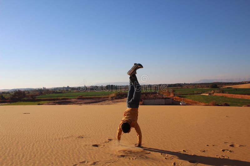 Boy flipping upside down editorial stock photo. Image of daytime - 97475073