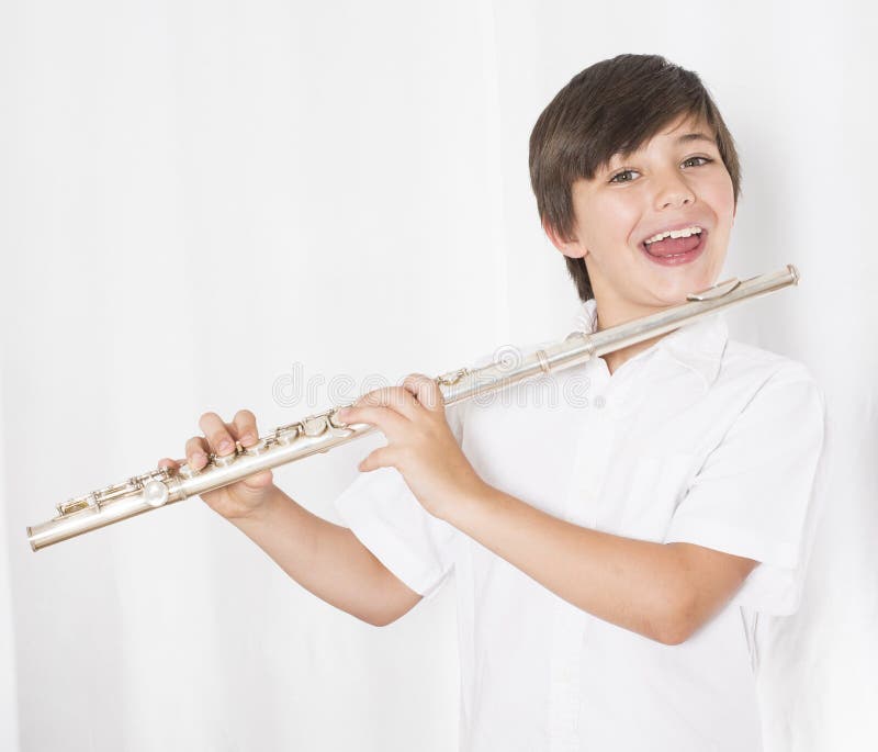 Young Flute Player Holding Flute and Smiling into the Camera Stock ...