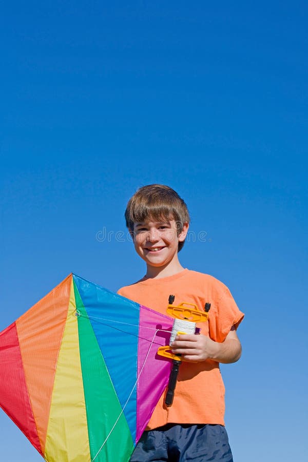 Boy Flying a Kite stock photo. Image of boys, outside - 8738696