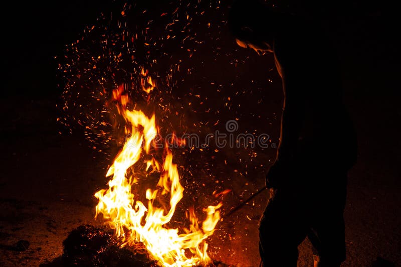 Boy in Front of the Fire of a Bonfire Stock Photo - Image of fire ...