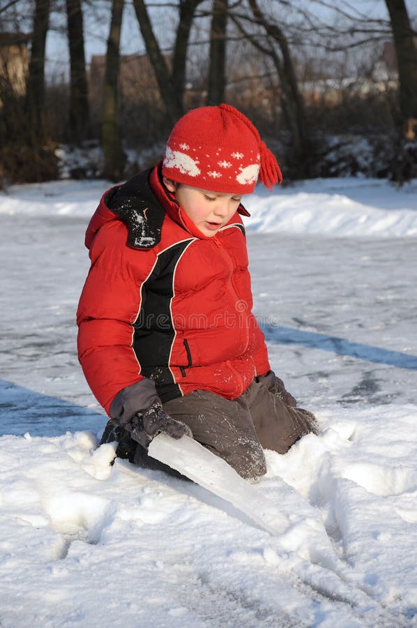 Boy on frozen river stock photo. Image of snow, outdoor - 27731098