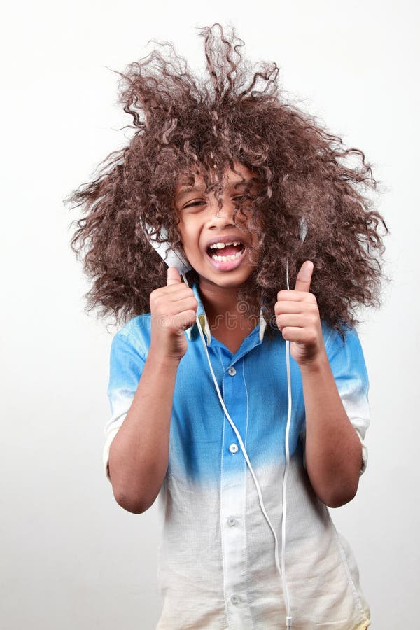 A Boy with a Funky Hairstyle Stock Photo - Image of shouting, mouth ...
