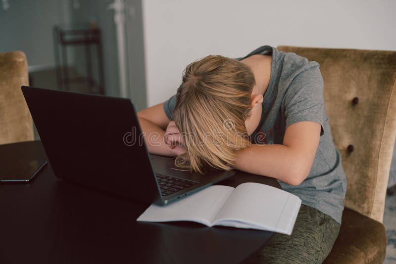 Boy Get Tired from Online Study at Home, he Lied Down His Lied on the ...