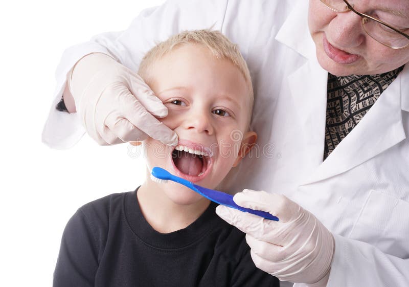 Boy Gets Help by the Dentist To Brush His Teeth Stock Image - Image of ...