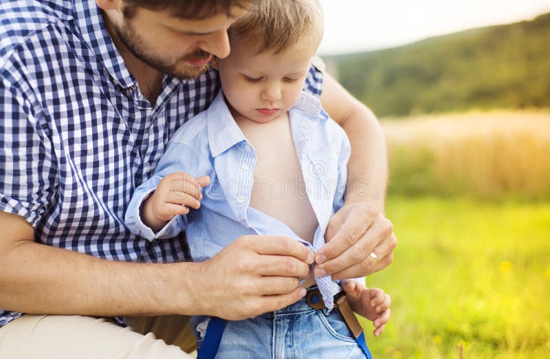 Boy getting dressed stock image. Image of blue, garden - 49746583