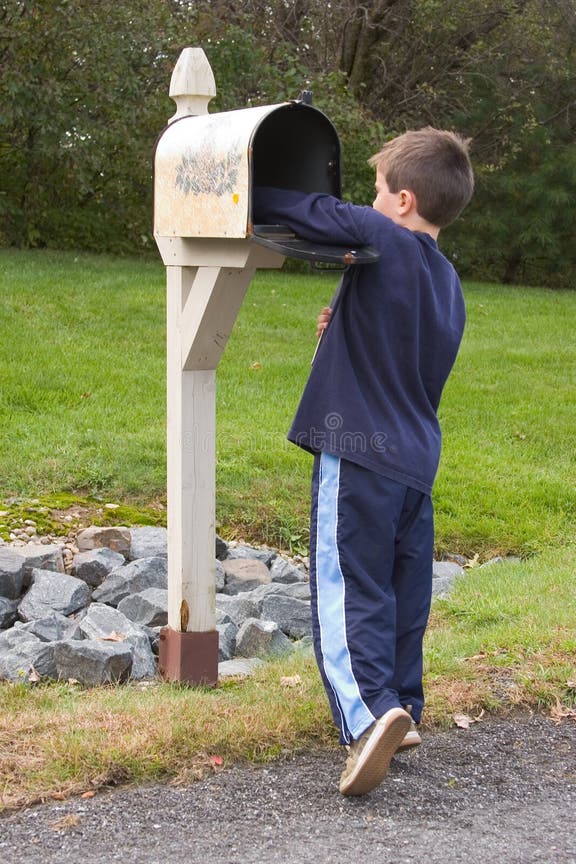 Boy getting mail stock image. Image of mailbox, service - 1322157