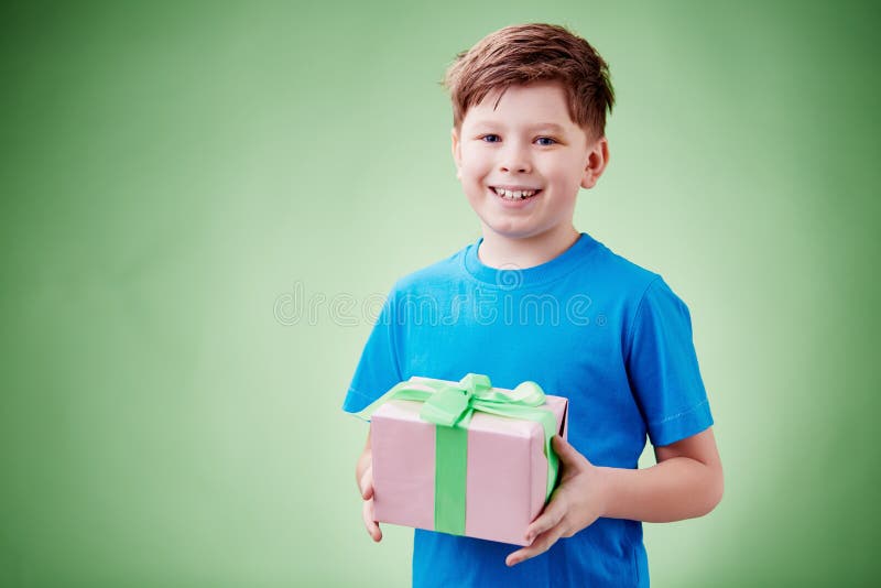 Boy with gift box stock image. Image of occasion, ribbon - 54934467