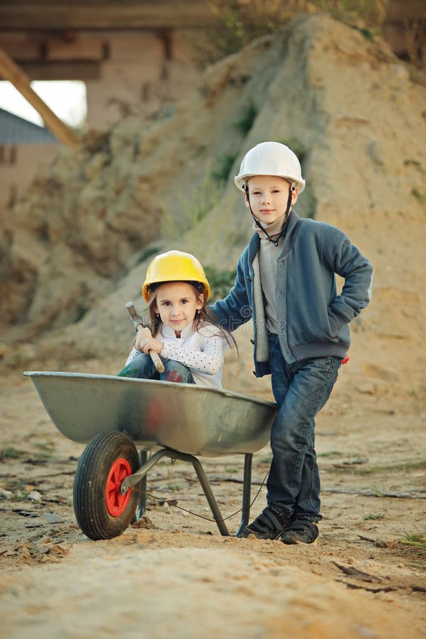 Boy and Girl Playing on Construction Site Stock Photo - Image of babies ...