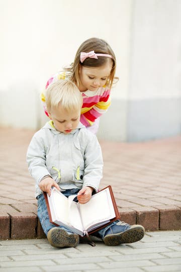 15,457 Boy Girl Reading Book Stock Photos - Free & Royalty-Free Stock ...