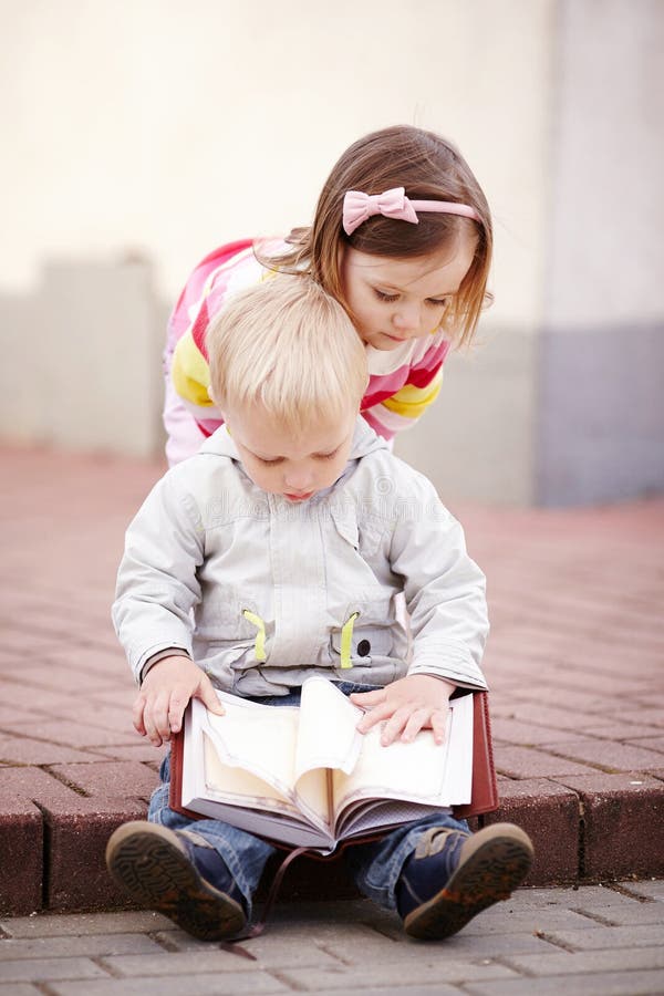 Little boy reads book stock photo. Image of leisure, hair - 28195686