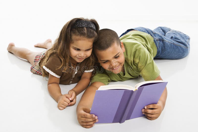 Boy and Girl Reading Book Together. Stock Image - Image of happy ...