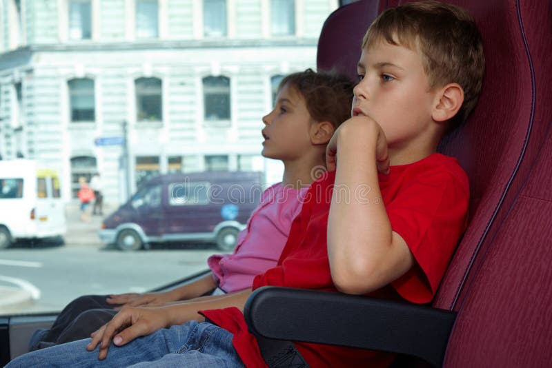 Boy and Girl Sit in Chairs in Bus Stock Image - Image of seat, outdoor ...