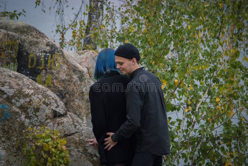 Boy and Girl Standing on a Rock on the Shore Stock Image - Image of ...