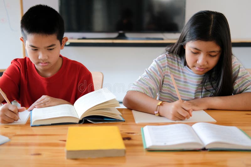 Boy Girl Student Studying Writing Notes Doing Homework. Learning ...