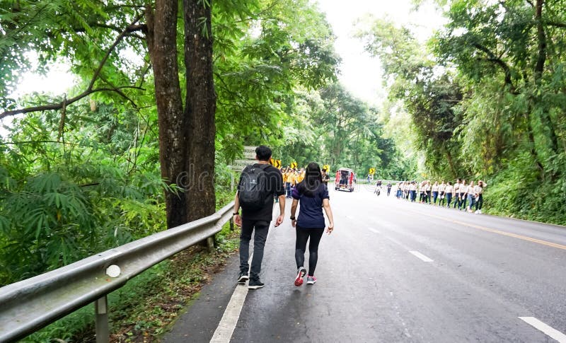 Boy and Girl Walk on Road editorial image. Image of road - 114697980