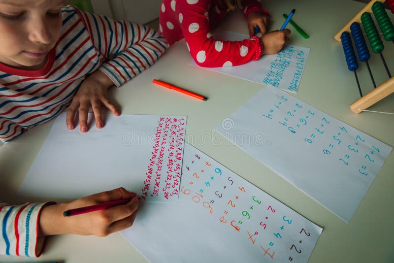 Boy and Girl Writing Numbers, Kids Doing Homework Stock Photo - Image ...