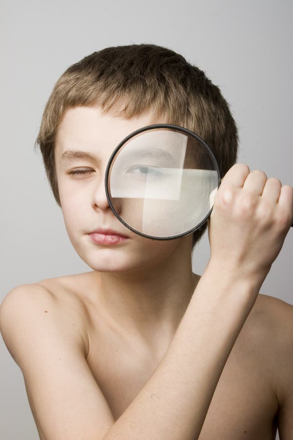 Boy with glass lens stock image. Image of cute, looking - 2063163