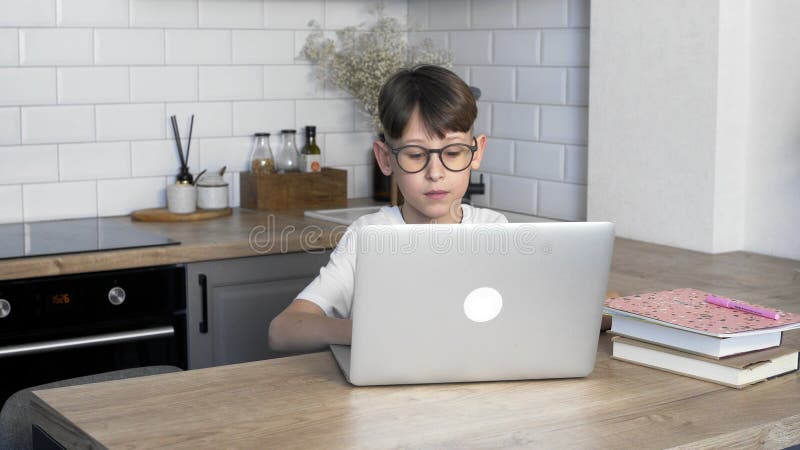 The Boy with Glasses Finished Doing His Homework and Sat Down at the ...