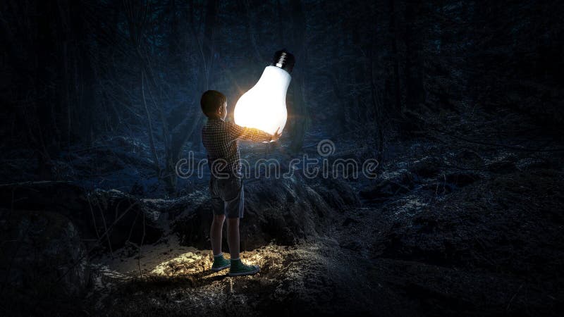 Boy with a Glowing Light Bulb . Mixed Media Stock Image - Image of lamp ...