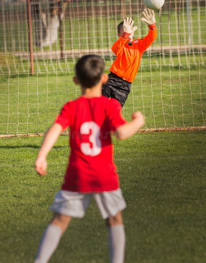 Boy goalkeeper defends stock image. Image of player, goalman - 70127009