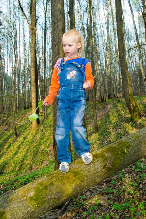 Boy goes on a log stock image. Image of leisure, flowing - 40332445