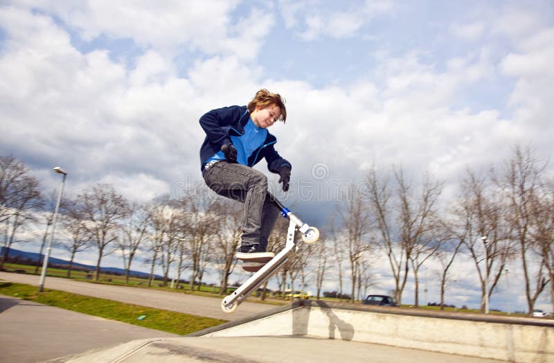 Boy Going Airborne with a Scooter Stock Image - Image of leisure ...