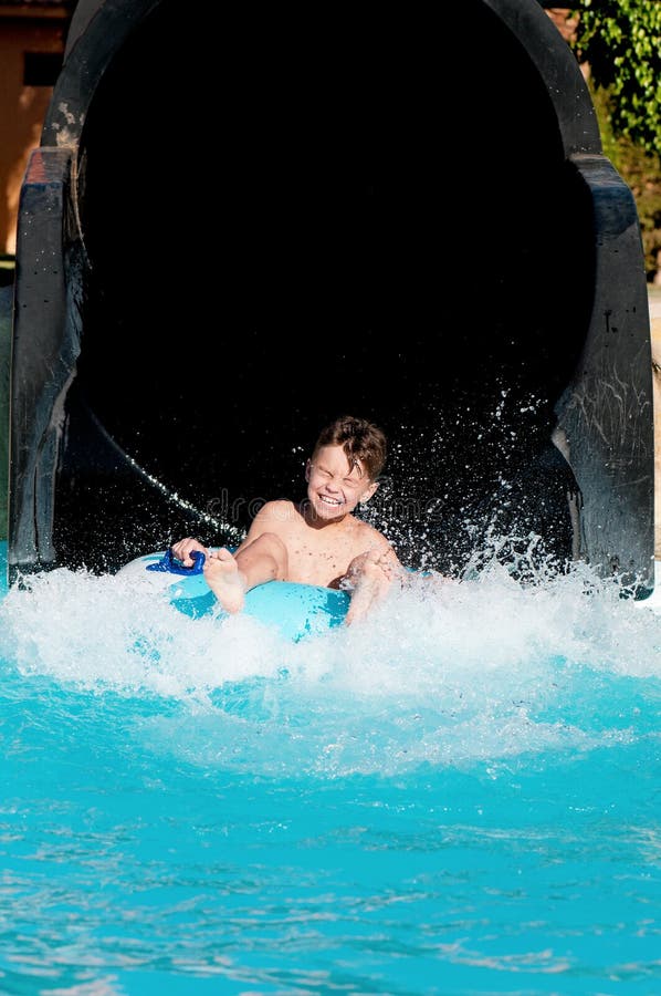 Boy Has Pool Going Down Water Slide Summer Stock Photos - Free ...