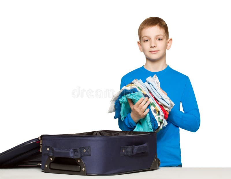 Little Boy Is Packing His Suitcase Stock Photo - Image of moving ...