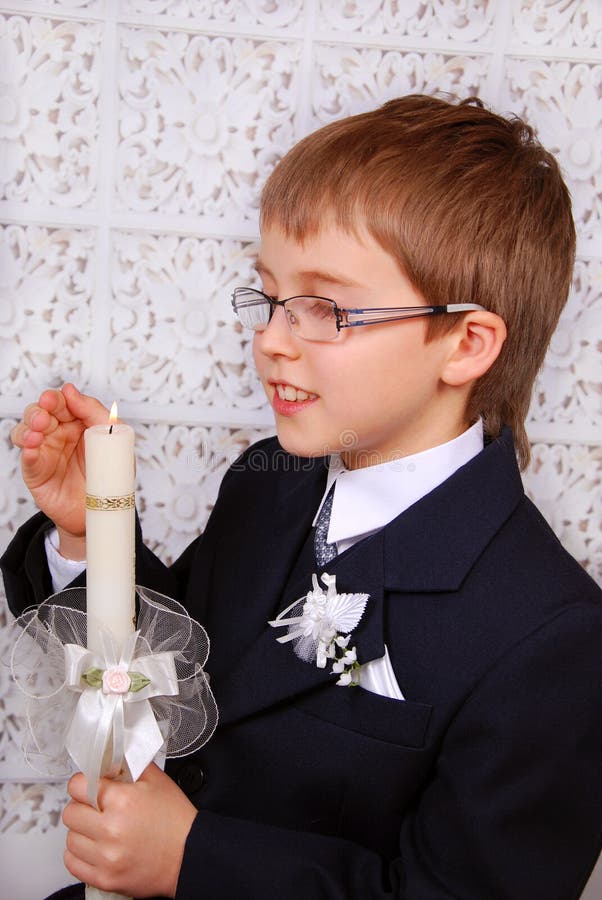 Boy Going To the First Holy Communion with Candle Stock Photo - Image ...