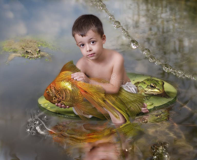 Boy and a goldfish stock photo. Image of frog, fish, toad - 11930546