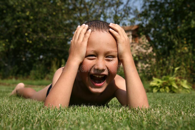 Boy in grass stock image. Image of rest, caucasian, garden - 8242103