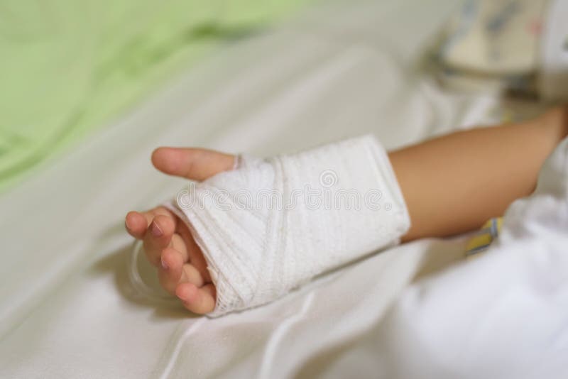 Boy hand with IV solution stock image. Image of cure - 60725635