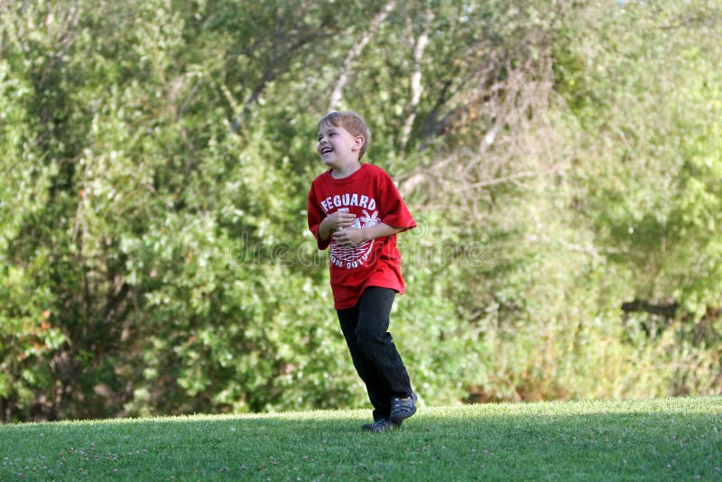 Boy happily runs at park stock image. Image of move, fitness - 11338695
