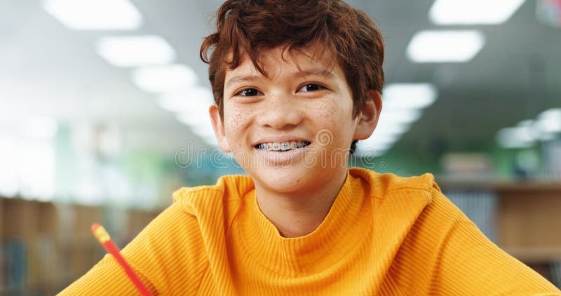 Boy, Happy and Child with Learning at Library with Math, Study or ...