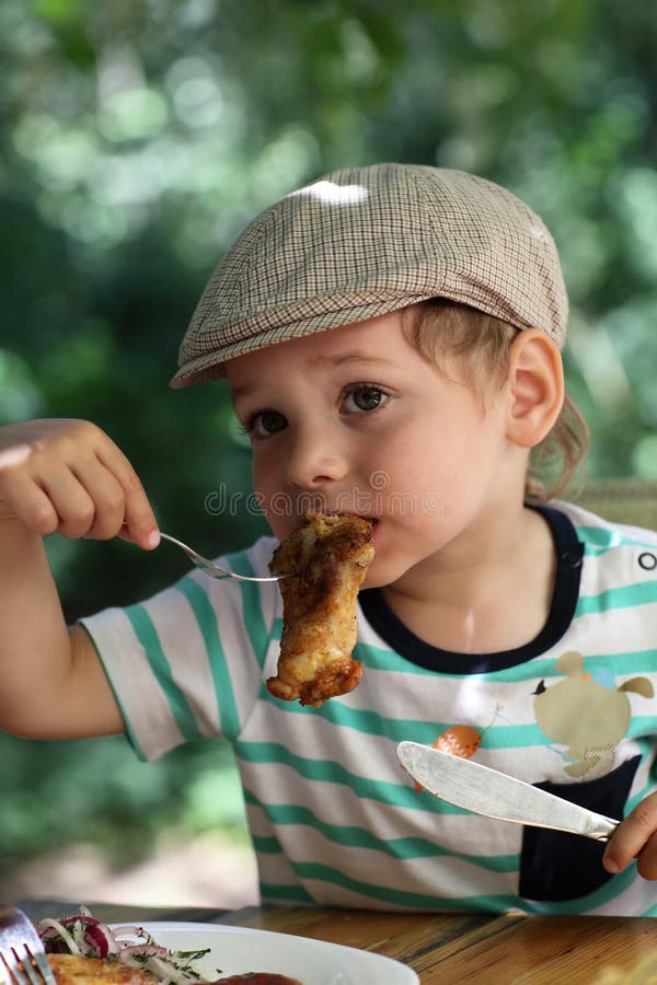 Boy has chicken stock image. Image of male, enjoyment - 44162227