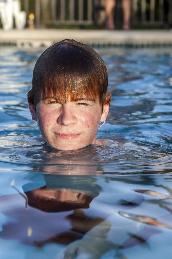 Boy Has Fun in the Outdoor Pool Stock Photo - Image of friendly, face ...