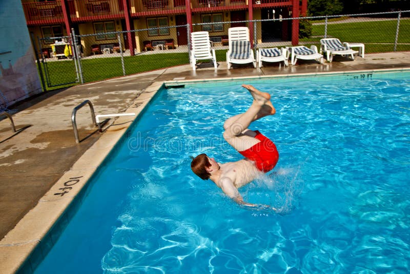 Boy has fun in the pool stock photo. Image of america - 36061668