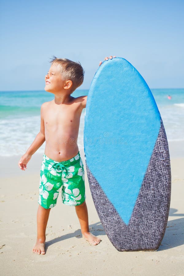 Boy Has Fun with the Surfboard Stock Photo - Image of fresh, horizontal ...