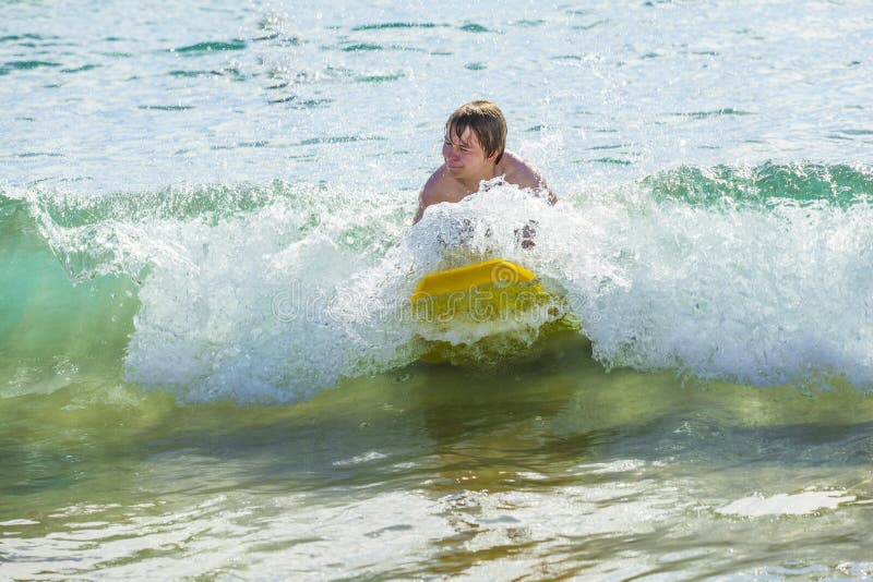 Boy Has Fun Surfing in the Waves Stock Photo - Image of summer ...
