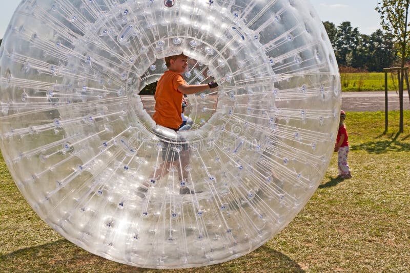 Boy Has a Lot of Fun in the Zorbing Ball Stock Image - Image of ...