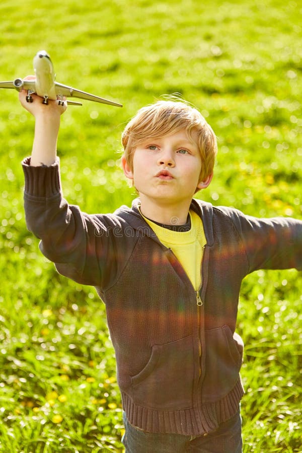 Boy Has a Plane Fly in His Imagination Stock Image - Image of preschool ...
