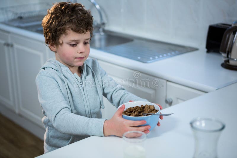 Boy Having Breakfast in the Kitchen Stock Image - Image of male ...