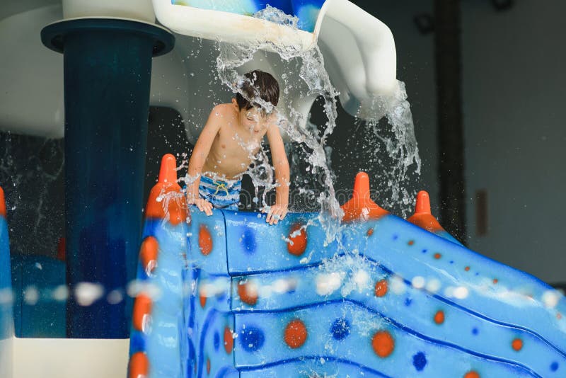 Boy Having Fun in Aqua Park Stock Image - Image of caucasian, pool ...