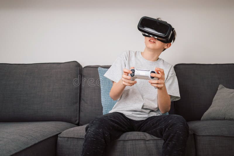 Boy Having Fun Playing Virtual Reality Simulation Games Stock Photo ...