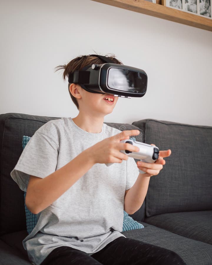 Boy Having Fun Playing Virtual Reality Simulation Games Stock Photo ...