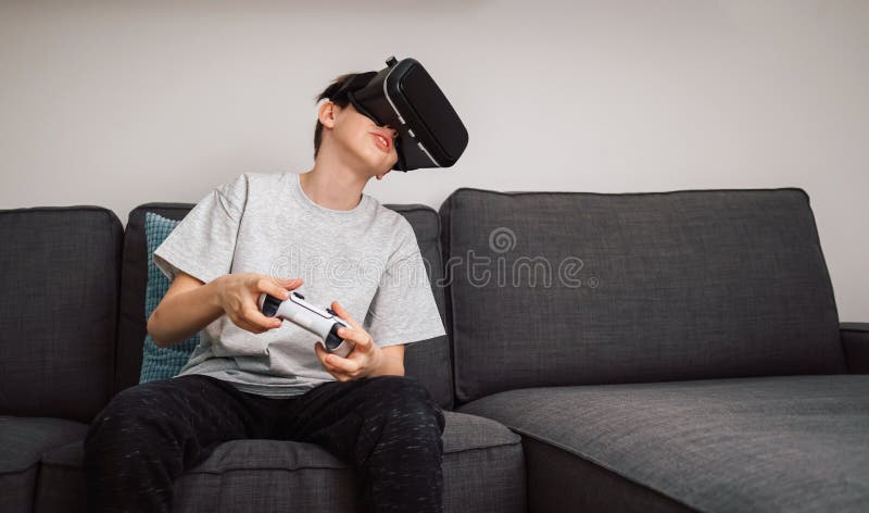 Boy Having Fun Playing Virtual Reality Simulation Games Stock Photo ...