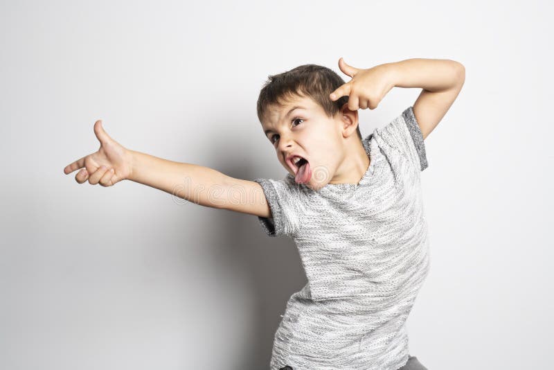 Boy Having Fun on Studio White Background Stock Photo - Image of ...