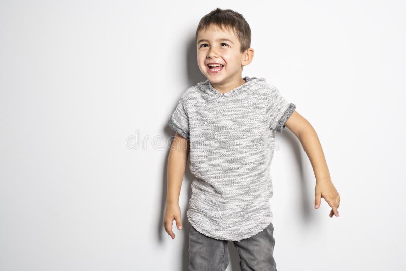 Boy Having Fun on Studio Grey Background Stock Image - Image of child ...