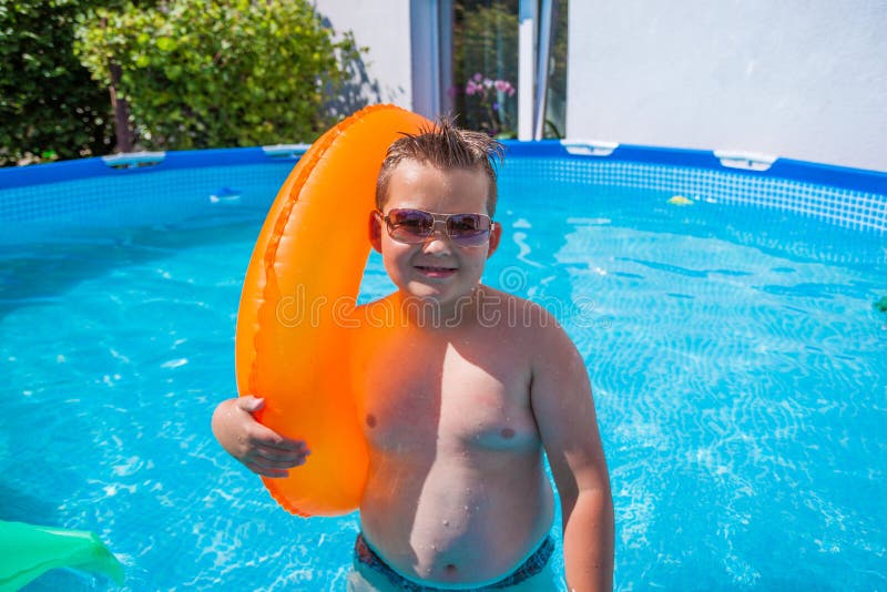 Boy in Having Fun in the Swimming Pool Stock Photo - Image of family ...